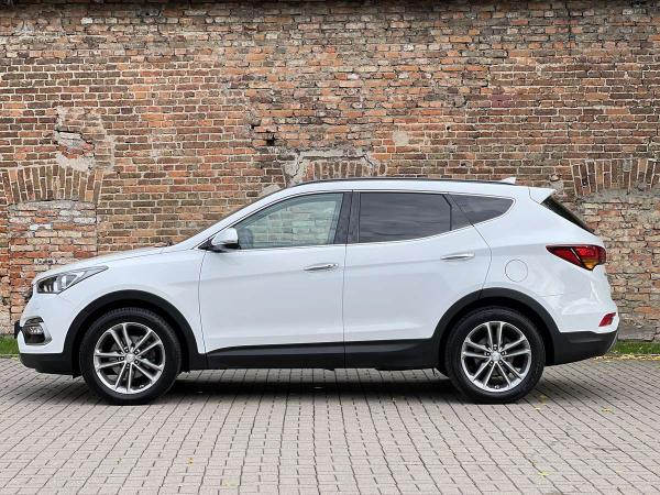 Hyundai Santa Fe 2017 in Kedainiai on AUTOMOTO.COM.LV White Hyundai Santa Fe 2017 in Kedainiai, with an engine capacity of 2.20 L and mileage of 123 thousand km for 14750 €, photo 11 on AUTOMOTO.COM.LV