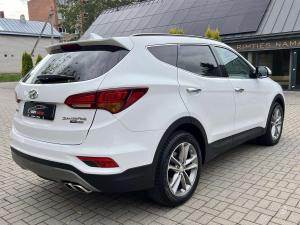 White Hyundai Santa Fe 2017 in Kedainiai, with an engine capacity of 2.20 L and mileage of 123 thousand km for 14750 €, photo 26 on AUTOMOTO.COM.LV
