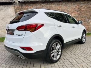 White Hyundai Santa Fe 2017 in Kedainiai, with an engine capacity of 2.20 L and mileage of 123 thousand km for 14750 €, photo 28 on AUTOMOTO.COM.LV
