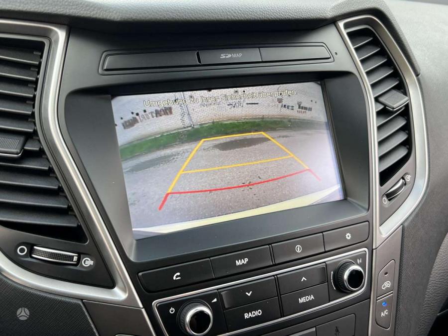 White Hyundai Santa Fe 2017 in Kedainiai, with an engine capacity of 2.20 L and mileage of 123 thousand km for 14750 €, photo 50 on AUTOMOTO.COM.LV