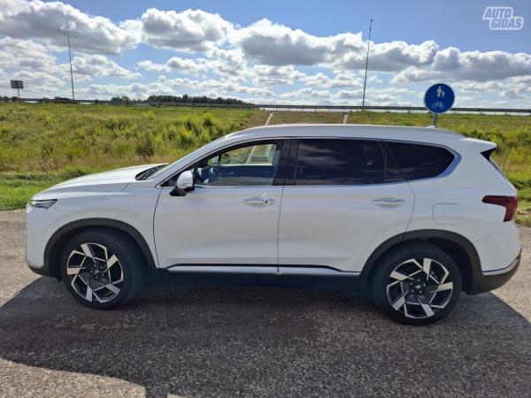 White Hyundai Santa Fe 2021 in Siauliai, with an engine capacity of 2.20 L and mileage of 149 thousand km for 29500 €, photo 9 on AUTOMOTO.COM.LV
