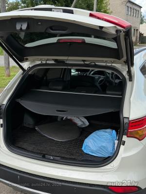 White Hyundai Santa Fe 2015 in Tallinn, with an engine capacity of 2.20 L and mileage of 150 thousand km for 15500 €, photo 11 on AUTOMOTO.COM.LV
