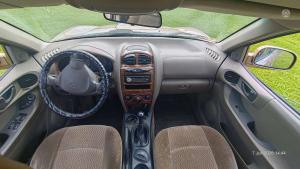 Yellow Hyundai Santa Fe 2002 in Vilnius, with an engine capacity of 1.99 L and mileage of 312 thousand km for 1500 €, photo 9 on AUTOMOTO.COM.LV