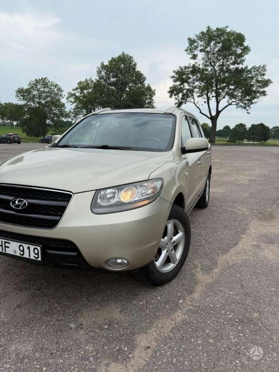 Yellow Hyundai Santa Fe 2006 in Kaunas, with an engine capacity of 2.66 L and mileage of 145 thousand km for 3849 €, photo 4 on AUTOMOTO.COM.LV