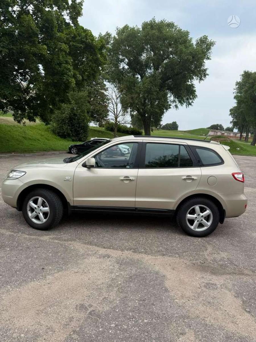 Yellow Hyundai Santa Fe 2006 in Kaunas, with an engine capacity of 2.66 L and mileage of 145 thousand km for 3849 €, photo 7 on AUTOMOTO.COM.LV