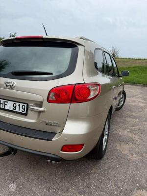 Yellow Hyundai Santa Fe 2006 in Kaunas, with an engine capacity of 2.66 L and mileage of 145 thousand km for 3849 €, photo 8 on AUTOMOTO.COM.LV