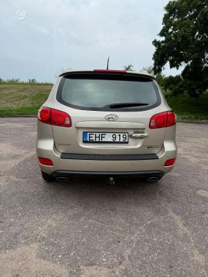 Yellow Hyundai Santa Fe 2006 in Kaunas, with an engine capacity of 2.66 L and mileage of 145 thousand km for 3849 €, photo 10 on AUTOMOTO.COM.LV