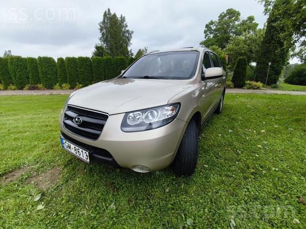 Yellow Hyundai Santa Fe 2007 in Riga, with an engine capacity of 2.20 L and mileage of 215 thousand km for 3995 €, photo 2 on AUTOMOTO.COM.LV