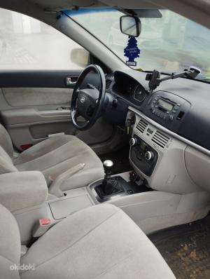 Melns Hyundai Sonata 2006 Tallina, ar dzinēja tilpumu 2.40 L un nobraukumu 179 tūkst. km par 2199 €, foto 11 vietnē AUTOMOTO.COM.LV