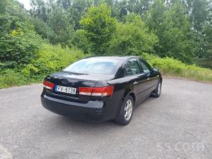 Black Hyundai Sonata 2006 in Riga, with an engine capacity of 2.40 L and mileage of 120 thousand km for 1800 €, photo 5 on AUTOMOTO.COM.LV