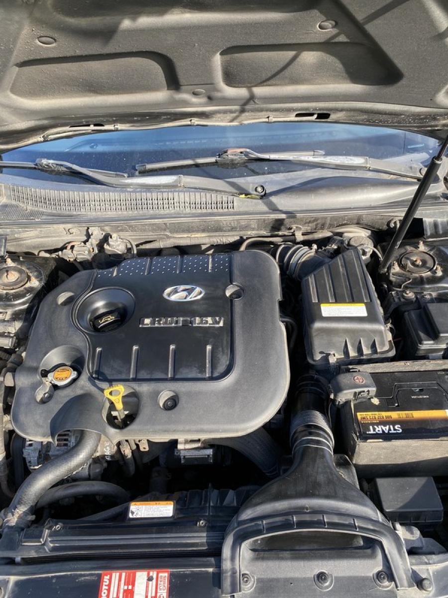 Black Hyundai Sonata 2007 in Narva, with an engine capacity of 2.00 L and mileage of 385 thousand km for 1500 €, photo 17 on AUTOMOTO.COM.LV