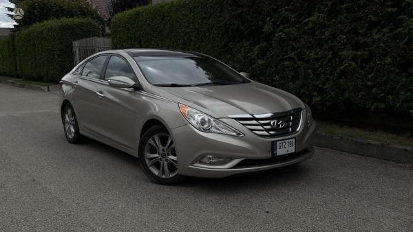 Brown Hyundai Sonata 2014 in Vilnius, with an engine capacity of 2.36 L and mileage of 140 thousand km for 4300 €, photo 6 on AUTOMOTO.COM.LV