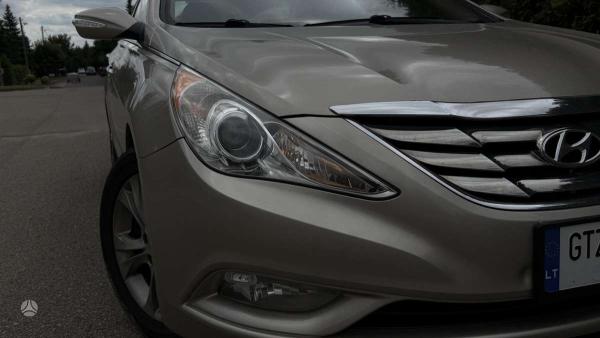Brown Hyundai Sonata 2014 in Vilnius, with an engine capacity of 2.36 L and mileage of 140 thousand km for 4300 €, photo 7 on AUTOMOTO.COM.LV
