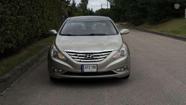 Brown Hyundai Sonata 2014 in Vilnius, with an engine capacity of 2.36 L and mileage of 140 thousand km for 4300 €, photo 8 on AUTOMOTO.COM.LV
