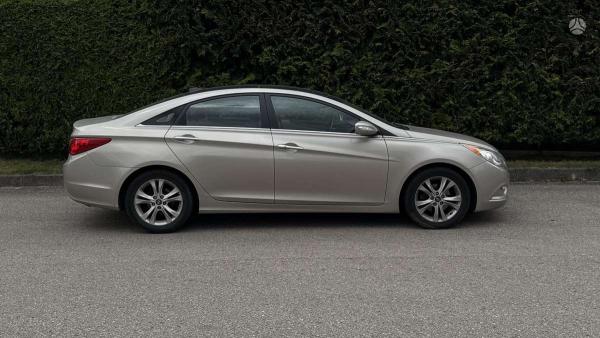 Brown Hyundai Sonata 2014 in Vilnius, with an engine capacity of 2.36 L and mileage of 140 thousand km for 4300 €, photo 9 on AUTOMOTO.COM.LV