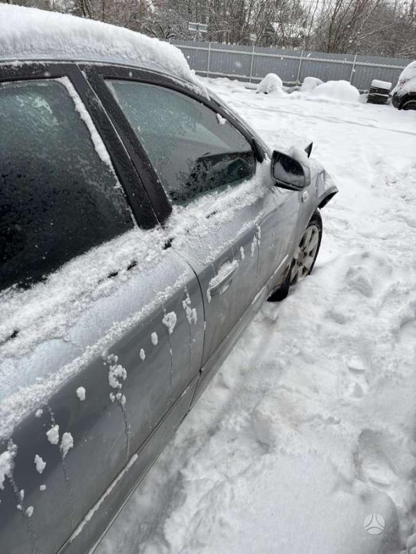Grey Hyundai Sonata 2007 in Kaunas, with an engine capacity of 2.00 L and mileage of 340 thousand km for 450 €, photo 6 on AUTOMOTO.COM.LV