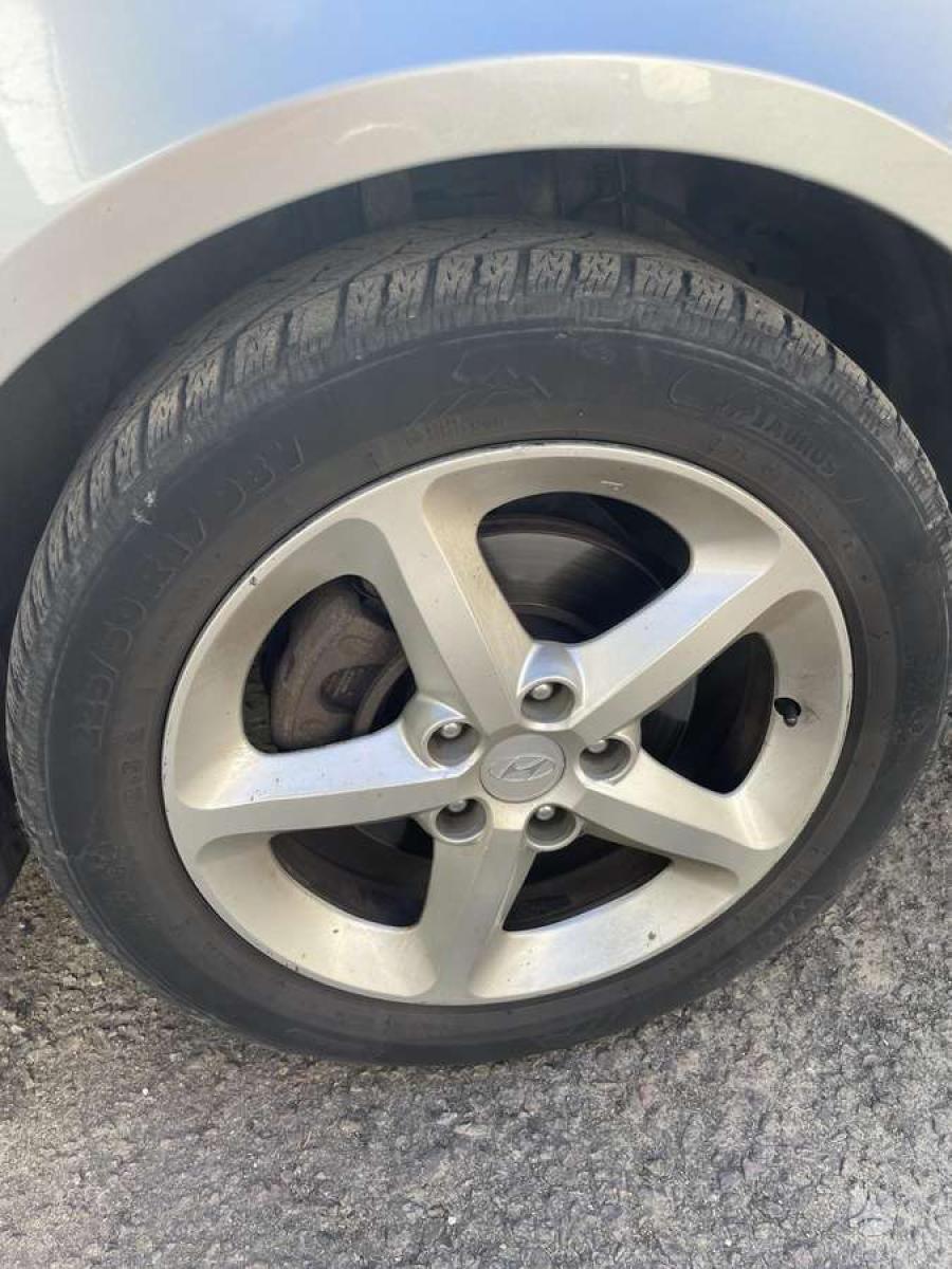 Grey Hyundai Sonata 2010 in Vilnius, with an engine capacity of 1.99 L and mileage of 253 thousand km for 1900 €, photo 11 on AUTOMOTO.COM.LV