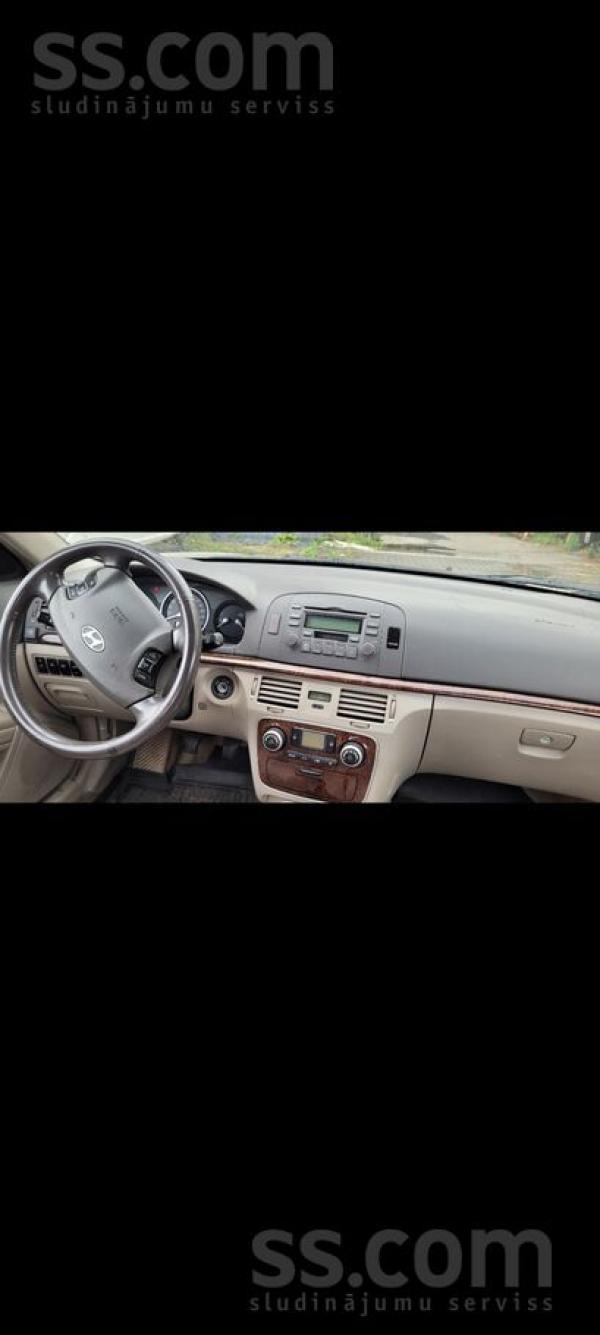 Yellow Hyundai Sonata 2006 in Riga, with an engine capacity of 2.40 L and mileage of 286 thousand km for 950 €, photo 6 on AUTOMOTO.COM.LV