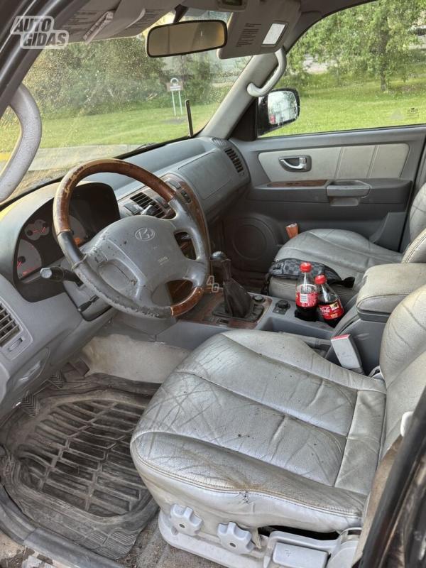 Melns Hyundai Terracan 2004 Šalčininkai, ar dzinēja tilpumu 2.90 L un nobraukumu 3 tūkst. km par 1400 €, foto 7 vietnē AUTOMOTO.COM.LV