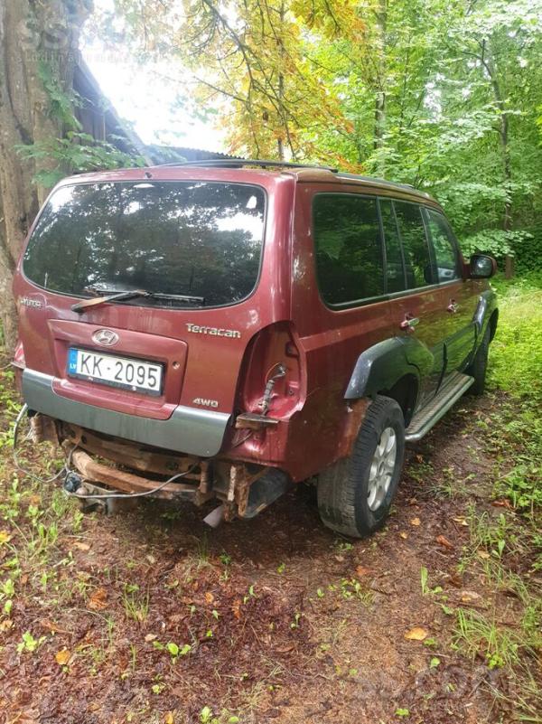 Sarkans Hyundai Terracan 2005 Limbaži, ar dzinēja tilpumu 2.90 L un nobraukumu 346 tūkst. km par 1499 €, foto 3 vietnē AUTOMOTO.COM.LV