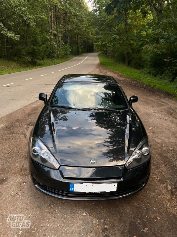 Black Hyundai Tiburon 2007 in Kaunas, with an engine capacity of 2.00 L and mileage of 215 thousand km for 3900 €, photo 3 on AUTOMOTO.COM.LV