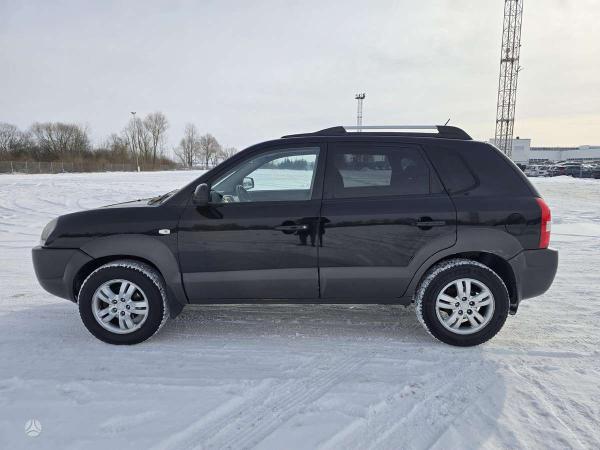 Melns Hyundai Tucson 2005 Marijampole, ar dzinēja tilpumu 1.99 L un nobraukumu 211 tūkst. km par 2400 €, foto 7 vietnē AUTOMOTO.COM.LV