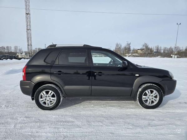 Melns Hyundai Tucson 2005 Marijampole, ar dzinēja tilpumu 1.99 L un nobraukumu 211 tūkst. km par 2400 €, foto 8 vietnē AUTOMOTO.COM.LV