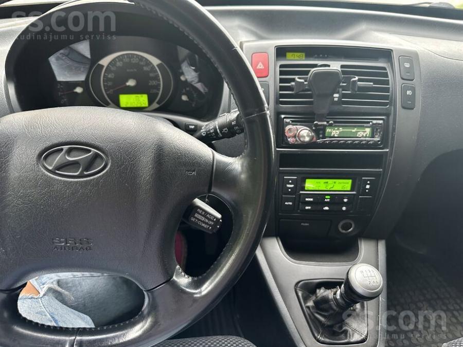 Melns Hyundai Tucson 2006 Talsi, ar dzinēja tilpumu 2.00 L un nobraukumu 210 tūkst. km par 3700 €, foto 12 vietnē AUTOMOTO.COM.LV