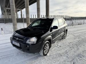 Black Hyundai Tucson 2006 in Kaunas, with an engine capacity of 2.00 L and mileage of 180 thousand km for 2200 €, photo 3 on AUTOMOTO.COM.LV