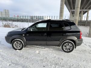 Black Hyundai Tucson 2006 in Kaunas, with an engine capacity of 2.00 L and mileage of 180 thousand km for 2200 €, photo 8 on AUTOMOTO.COM.LV