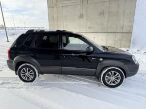 Black Hyundai Tucson 2006 in Kaunas, with an engine capacity of 2.00 L and mileage of 180 thousand km for 2200 €, photo 11 on AUTOMOTO.COM.LV
