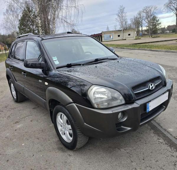 Melns Hyundai Tucson 2007 Tauragė, ar dzinēja tilpumu 1.99 L un nobraukumu 160 tūkst. km par 3990 €, foto 3 vietnē AUTOMOTO.COM.LV