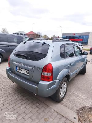 Black Hyundai Tucson 2007 in Kaunas, with an engine capacity of 2.00 L and mileage of 245 thousand km for 1299 €, photo 5 on AUTOMOTO.COM.LV