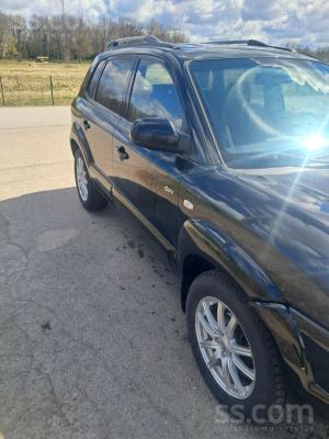 Melns Hyundai Tucson 2007 Rīga, ar dzinēja tilpumu 2.00 L un nobraukumu 228 tūkst. km par 1800 €, foto 5 vietnē AUTOMOTO.COM.LV