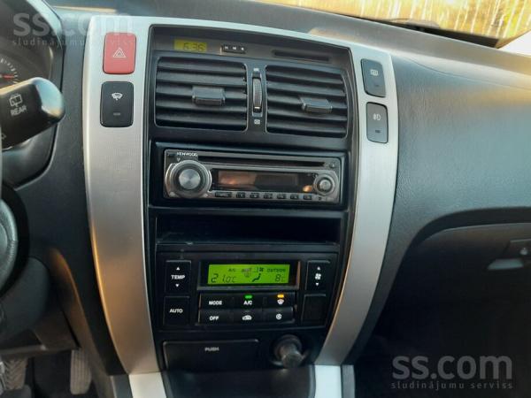 Black Hyundai Tucson 2007 in Kuldiga, with an engine capacity of 2.00 L and mileage of 289 thousand km for 2950 €, photo 5 on AUTOMOTO.COM.LV