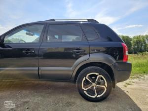 Black Hyundai Tucson 2007 in Siauliai, with an engine capacity of 2.00 L and mileage of 162 thousand km for 3500 €, photo 10 on AUTOMOTO.COM.LV
