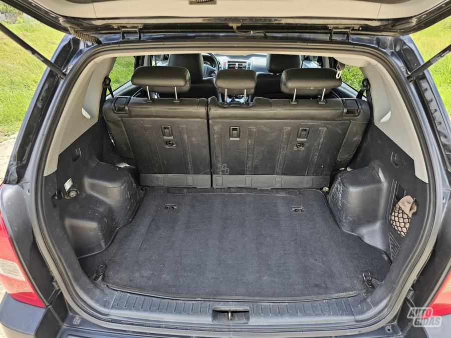 Black Hyundai Tucson 2007 in Siauliai, with an engine capacity of 2.00 L and mileage of 162 thousand km for 3500 €, photo 23 on AUTOMOTO.COM.LV