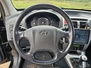 Black Hyundai Tucson 2007 in Siauliai, with an engine capacity of 2.00 L and mileage of 162 thousand km for 3500 €, photo 27 on AUTOMOTO.COM.LV