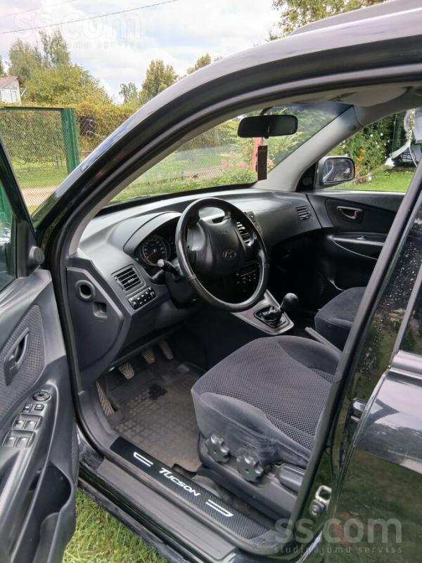 Melns Hyundai Tucson 2007 Rīga, ar dzinēja tilpumu 2.00 L un nobraukumu 303 tūkst. km par 1850 €, foto 9 vietnē AUTOMOTO.COM.LV