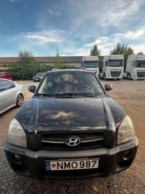 Black Hyundai Tucson 2007 in Vilnius, with an engine capacity of 1.99 L and mileage of 244 thousand km for 3200 €, photo  on AUTOMOTO.COM.LV