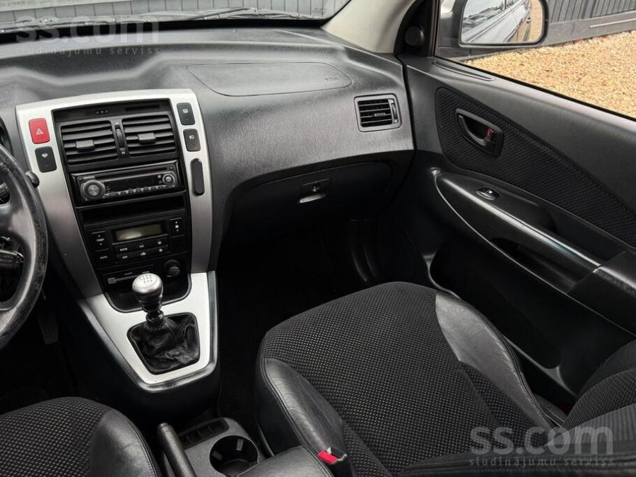 Melns Hyundai Tucson 2007 Jelgava, ar dzinēja tilpumu 2.00 L un nobraukumu 0 tūkst. km par 2150 €, foto 12 vietnē AUTOMOTO.COM.LV