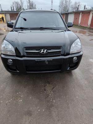 Black Hyundai Tucson 2008 in Marijampole, with an engine capacity of 2.00 L and mileage of 267 thousand km for 3499 €, photo  on AUTOMOTO.COM.LV