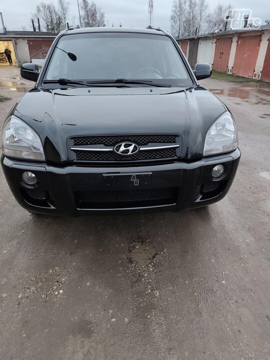 Melns Hyundai Tucson 2008 Marijampole, ar dzinēja tilpumu 2.00 L un nobraukumu 267 tūkst. km par 3499 €, foto 1 vietnē AUTOMOTO.COM.LV