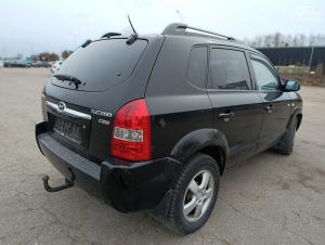 Black Hyundai Tucson 2008 in Marijampole, with an engine capacity of 2.00 L and mileage of 185 thousand km for 2400 €, photo 3 on AUTOMOTO.COM.LV