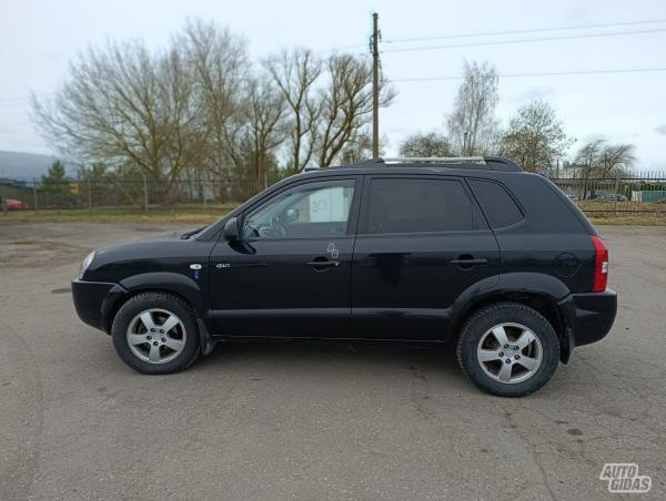 Black Hyundai Tucson 2008 in Marijampole, with an engine capacity of 2.00 L and mileage of 185 thousand km for 2400 €, photo 7 on AUTOMOTO.COM.LV