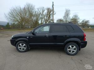 Black Hyundai Tucson 2008 in Marijampole, with an engine capacity of 2.00 L and mileage of 185 thousand km for 2400 €, photo 7 on AUTOMOTO.COM.LV