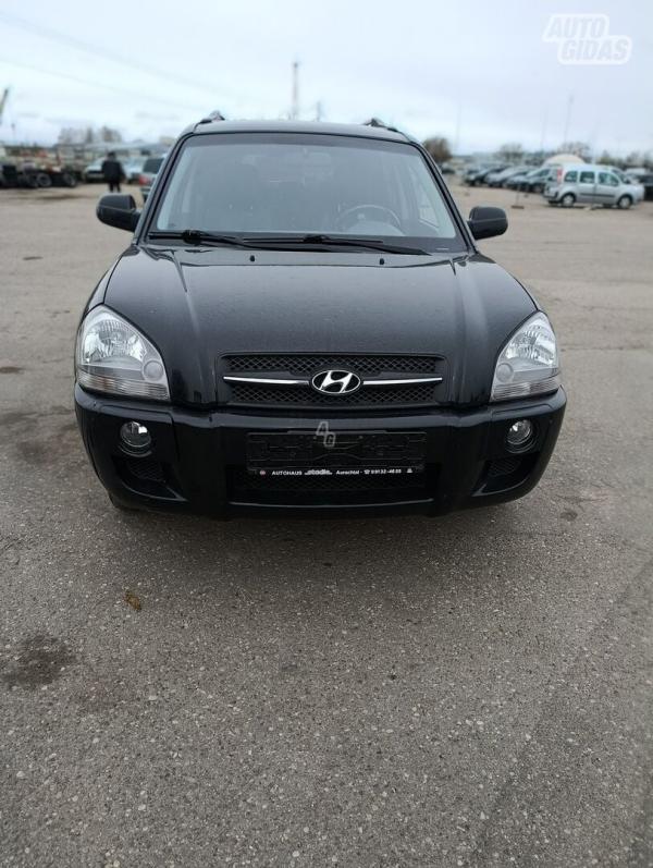 Black Hyundai Tucson 2008 in Marijampole, with an engine capacity of 2.00 L and mileage of 185 thousand km for 2400 €, photo 8 on AUTOMOTO.COM.LV