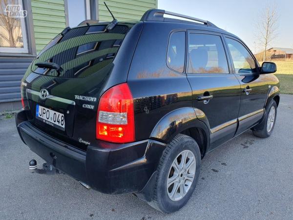 Black Hyundai Tucson 2008 in Siauliai, with an engine capacity of 2.00 L and mileage of 289 thousand km for 2900 €, photo 1 on AUTOMOTO.COM.LV