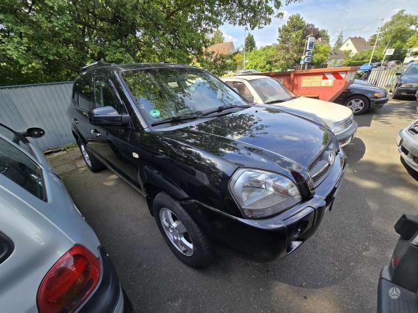 Black Hyundai Tucson 2008 in Marijampole, with an engine capacity of 1.98 L and mileage of 112 thousand km for 3900 €, photo 2 on AUTOMOTO.COM.LV