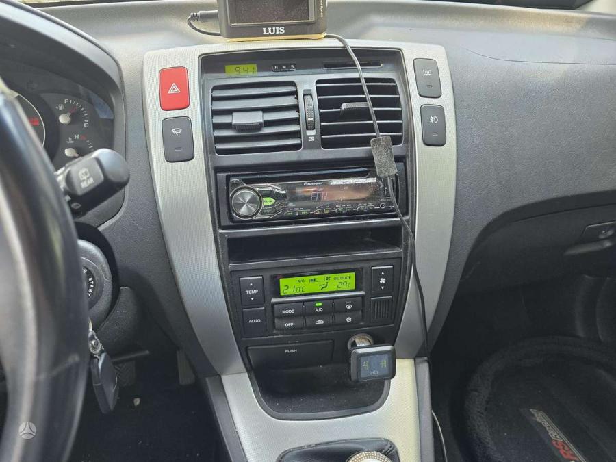 Melns Hyundai Tucson 2008 Marijampole, ar dzinēja tilpumu 1.98 L un nobraukumu 112 tūkst. km par 3900 €, foto 14 vietnē AUTOMOTO.COM.LV